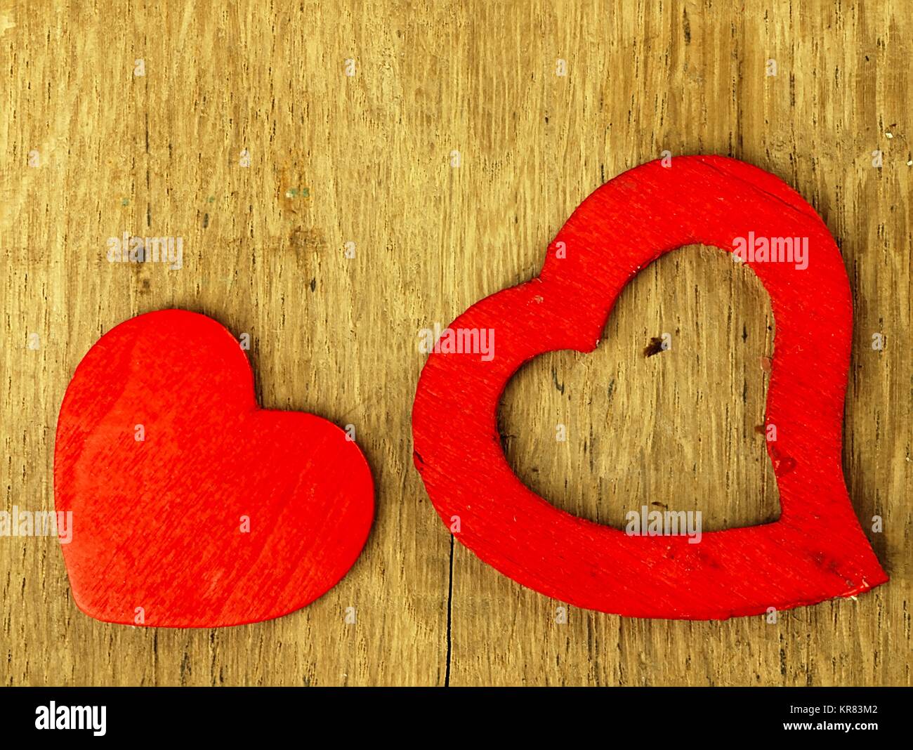 Wooden heart on the oak table Stock Photo - Alamy