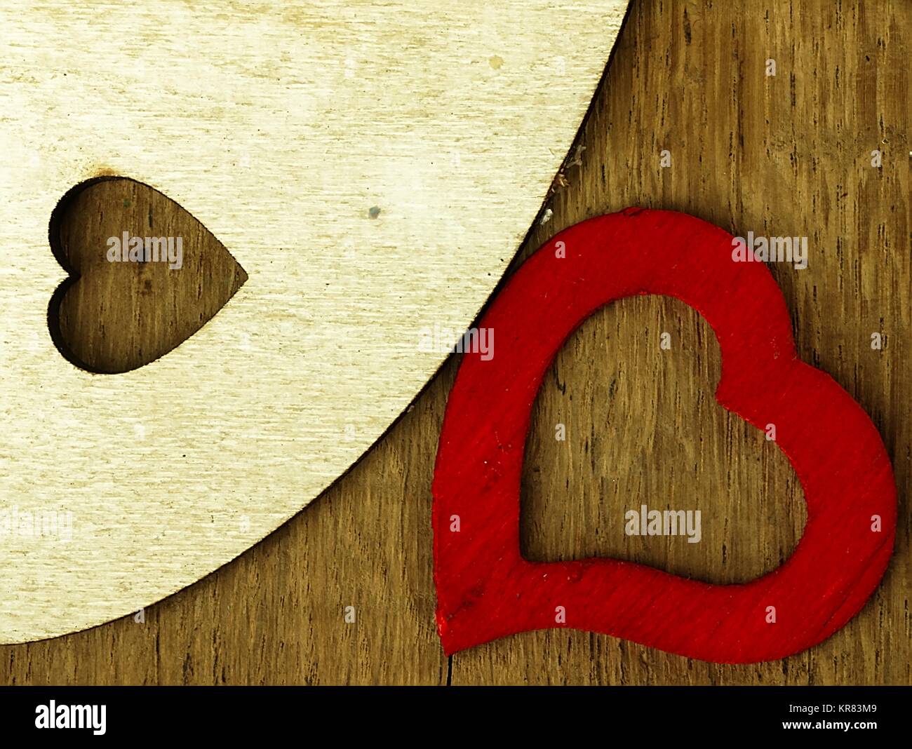 Wooden heart on the oak table Stock Photo - Alamy