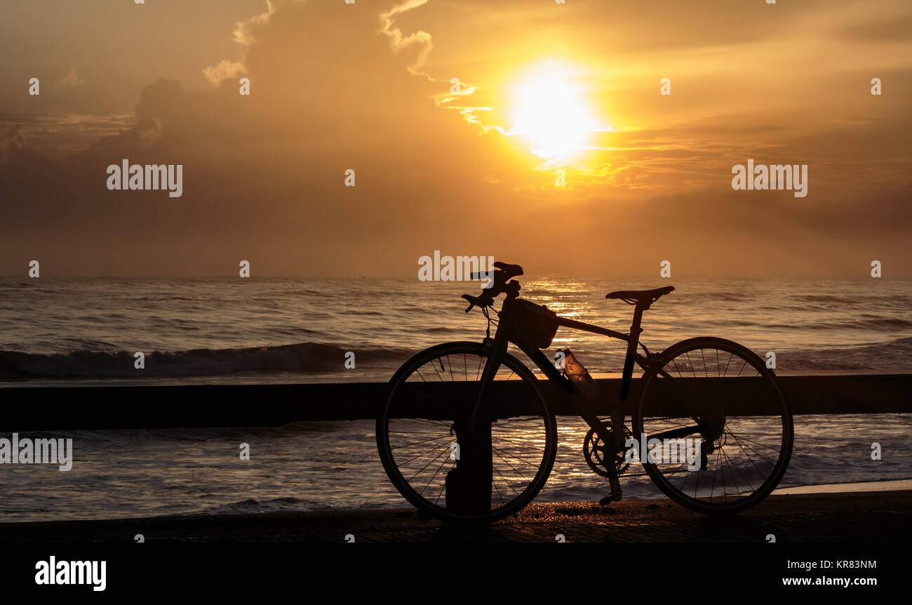 Bicycles and sunrise scenery in Songkhla province Stock Photo - Alamy