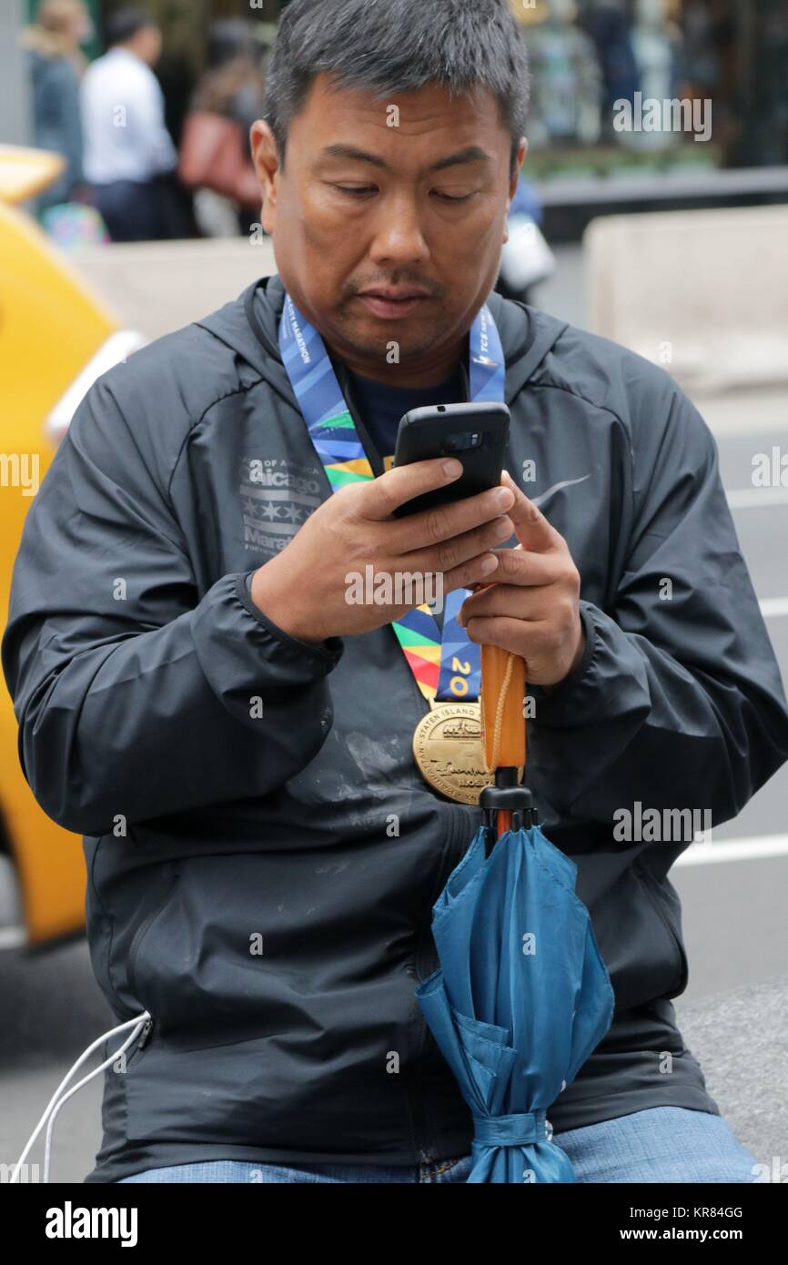 People using technology in their daily lives, New York USA Stock Photo ...