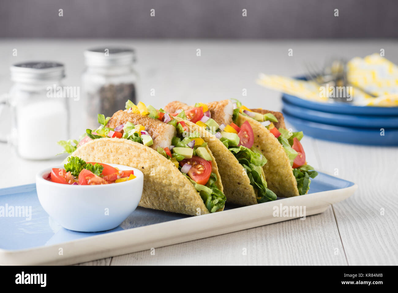 Fish tacos shell with avocado salsa Stock Photo - Alamy