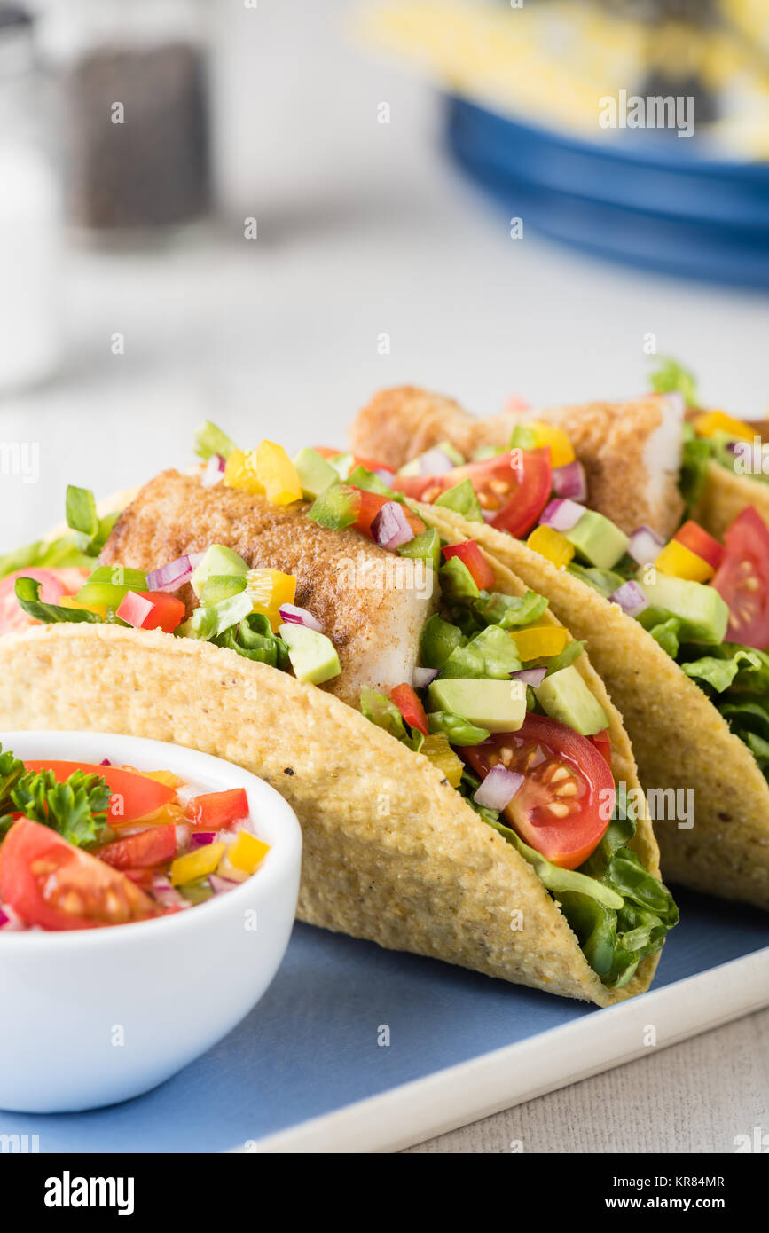 Fish tacos shell with avocado salsa Stock Photo - Alamy