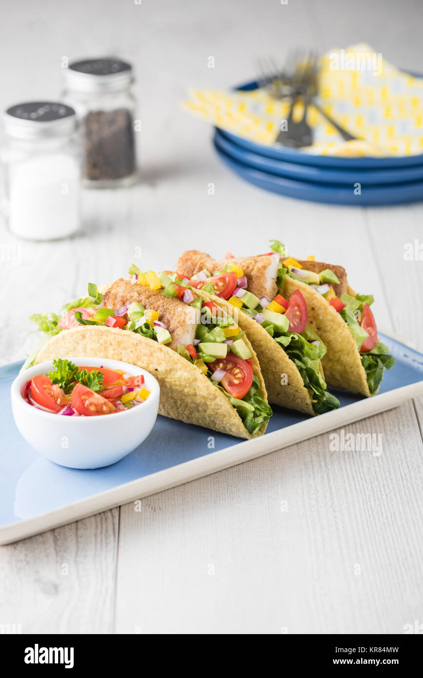 Fish tacos shell with avocado salsa Stock Photo - Alamy