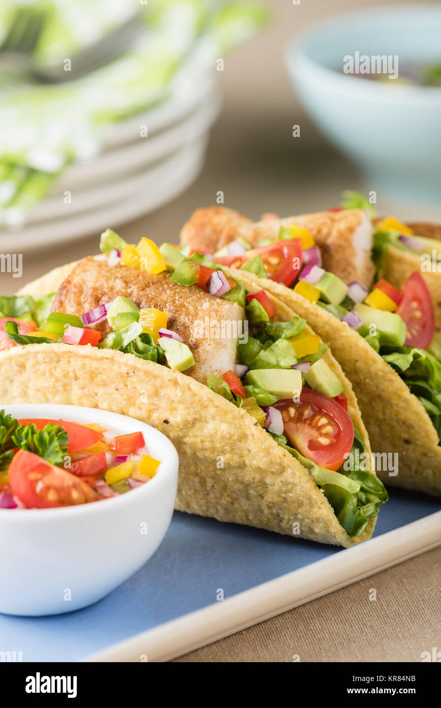 Fish tacos shell with avocado salsa Stock Photo - Alamy