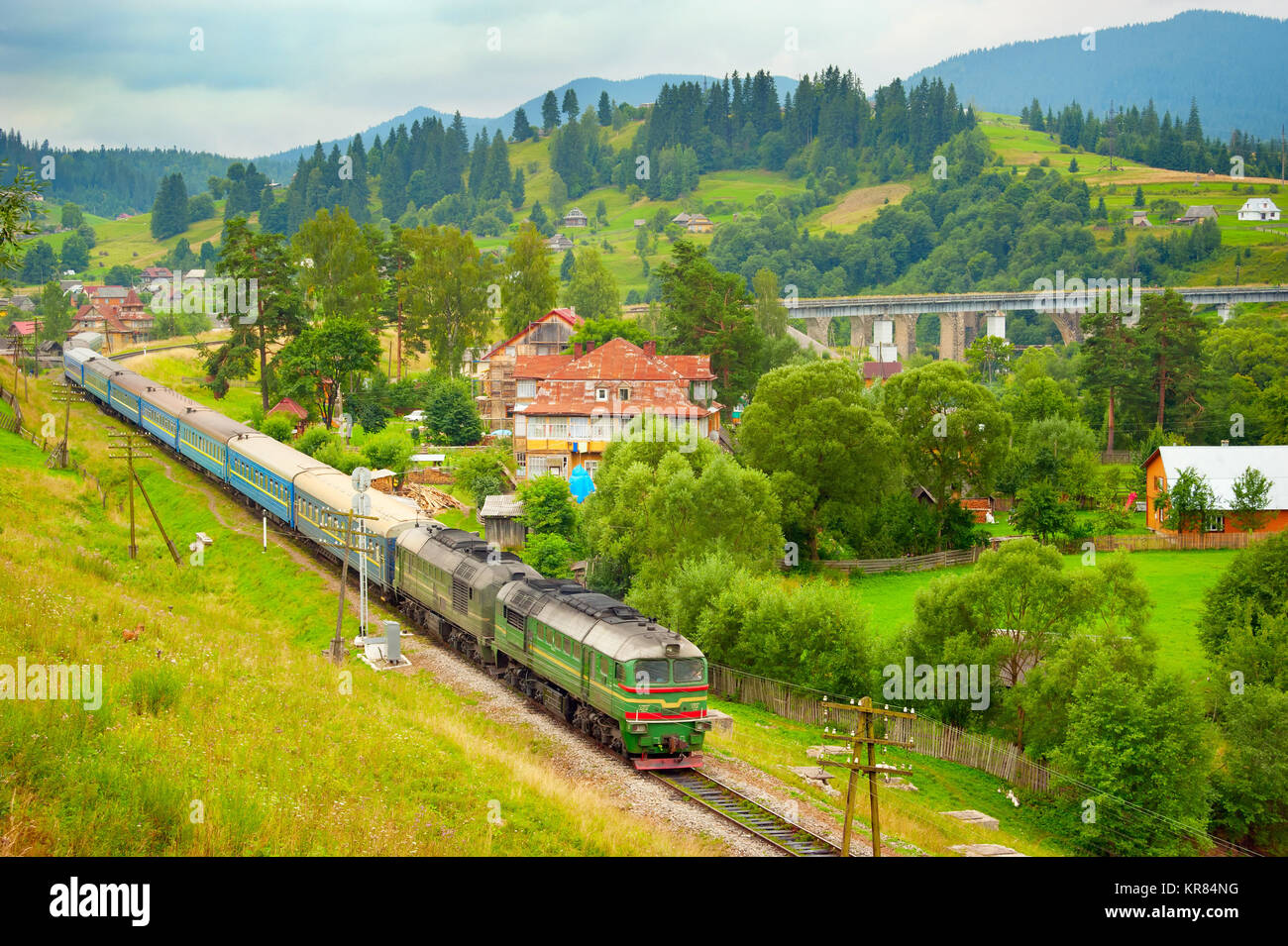 Train in the mountains Stock Photo - Alamy