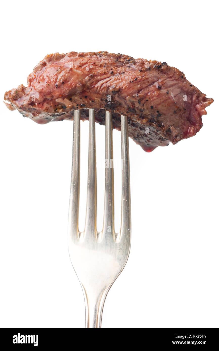 steak on a fork Stock Photo - Alamy