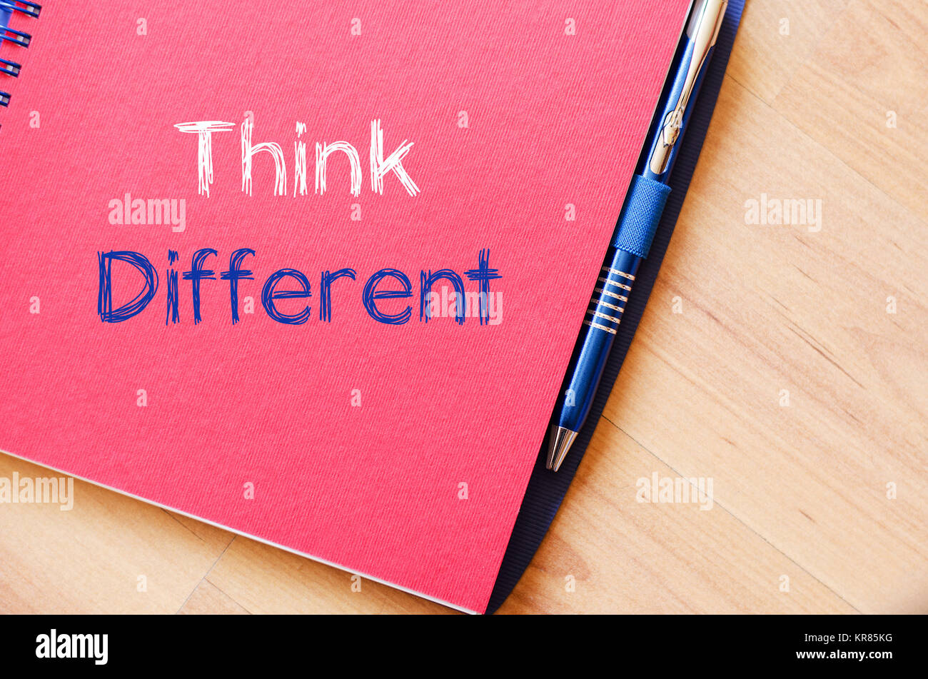 Think different text concept on notebook Stock Photo - Alamy