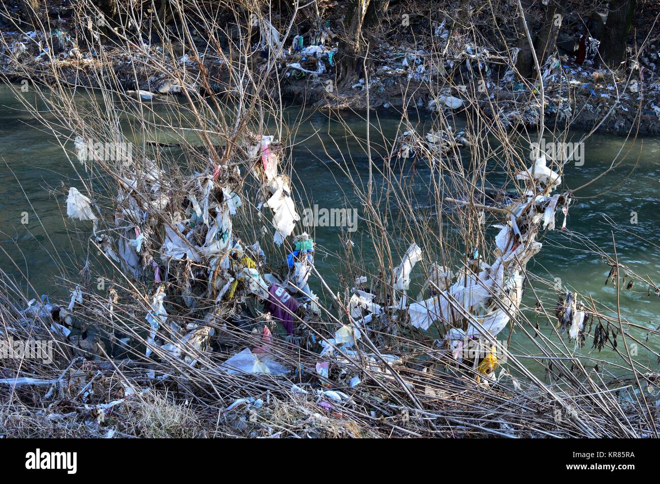 garbage by the river Stock Photo - Alamy