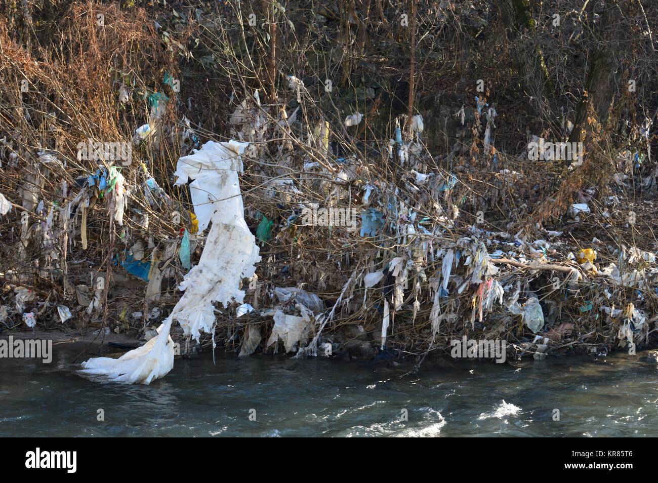 garbage by the river Stock Photo - Alamy