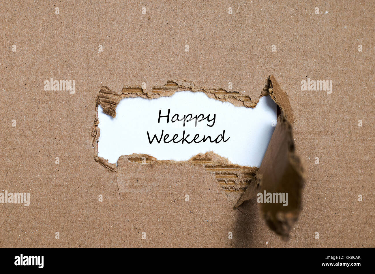 The words happy weekend appearing behind torn paper Stock Photo - Alamy