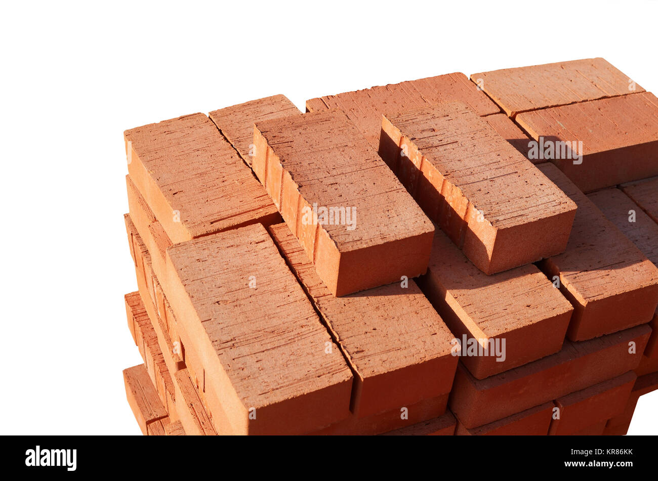Red brick is made from clay and fired in a fire Stock Photo - Alamy