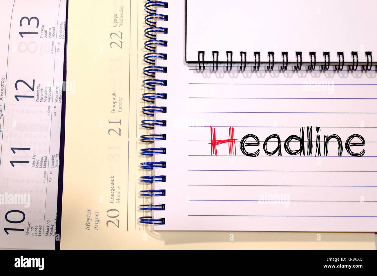 Headline text concept on notebook Stock Photo - Alamy