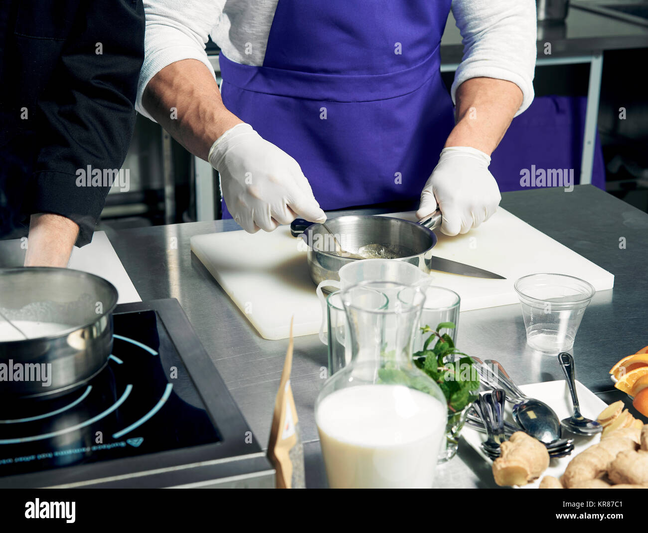 cooking ingredients in pan in the kitchen Stock Photo - Alamy