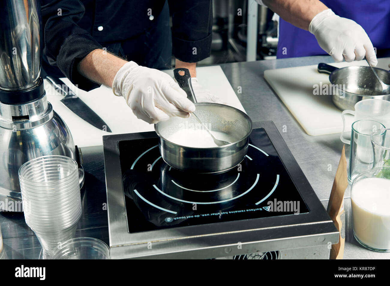 cooking ingredients in pan in the kitchen Stock Photo - Alamy
