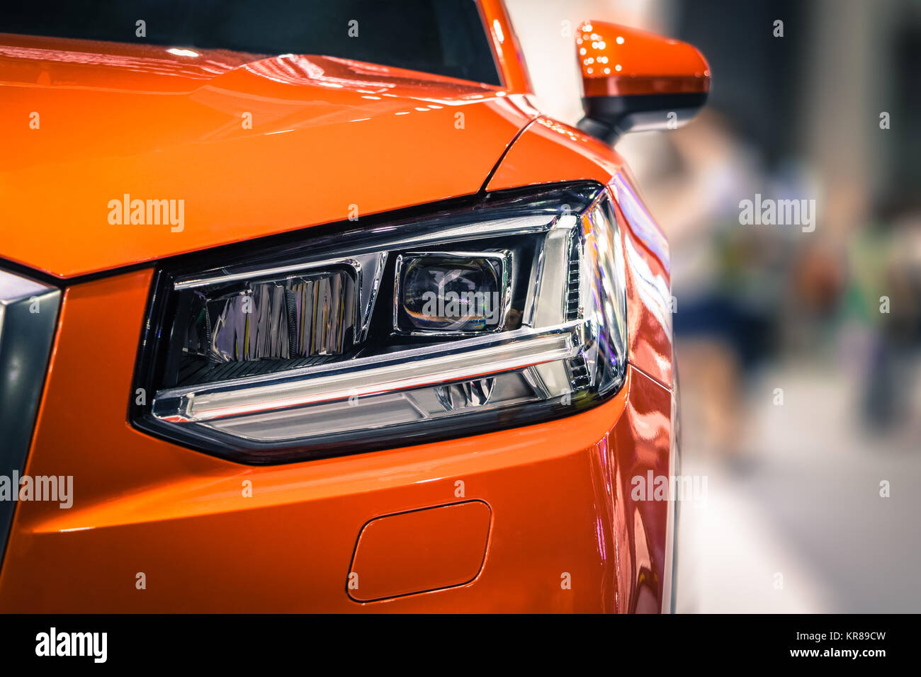The Closeup Front Headlight LED car in Motor Show Stock Photo - Alamy