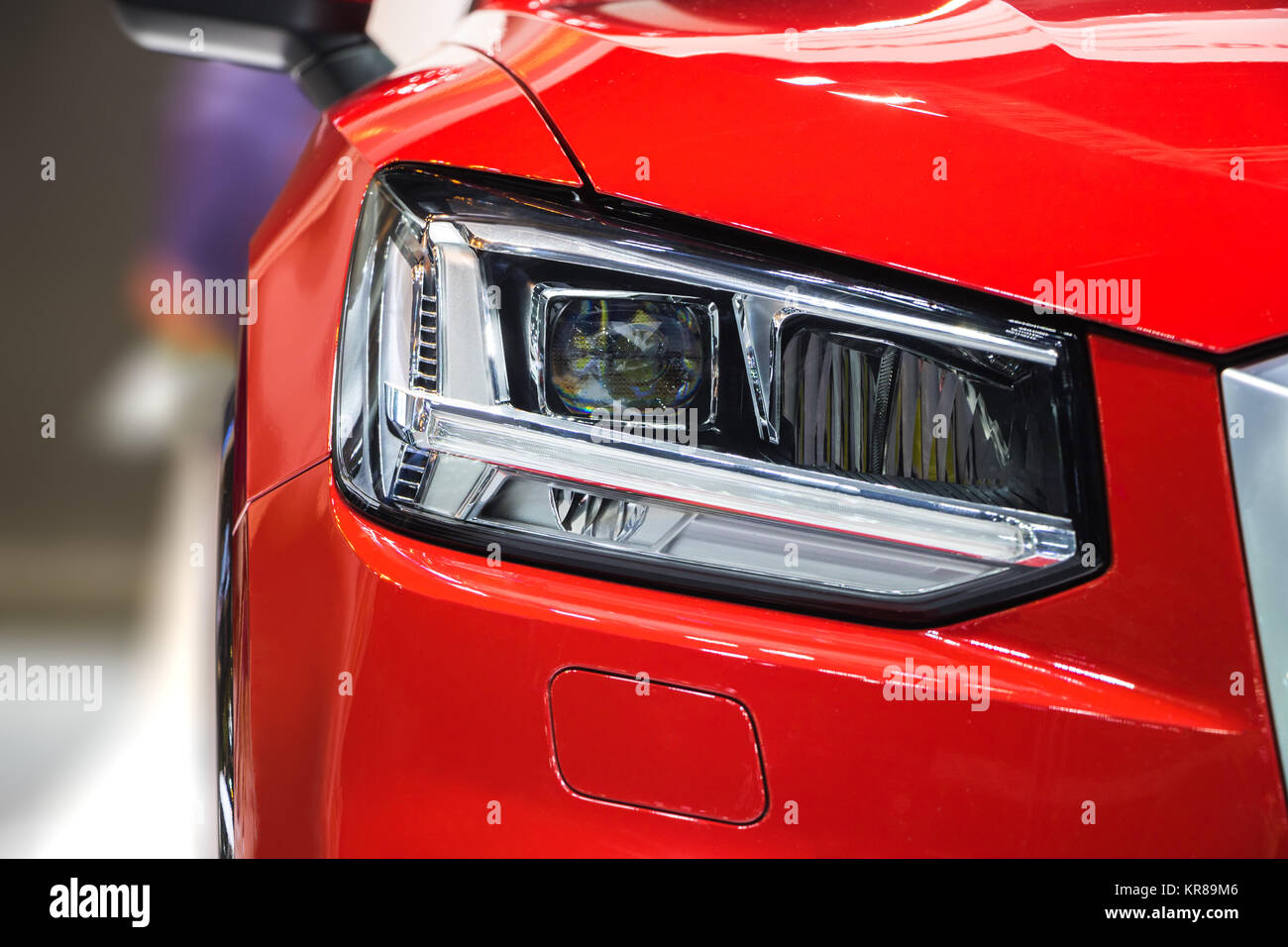 The Closeup Front Headlight LED car in Motor Show Stock Photo - Alamy