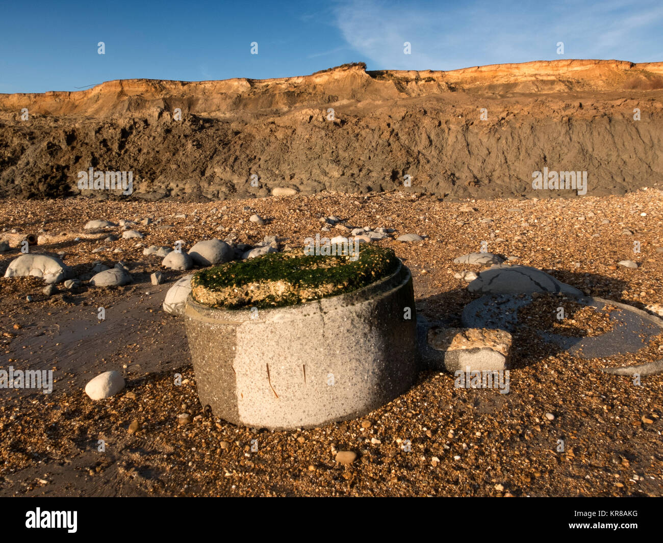 Evidence of cliff and coastal erosion, lost buildings and exposed ...