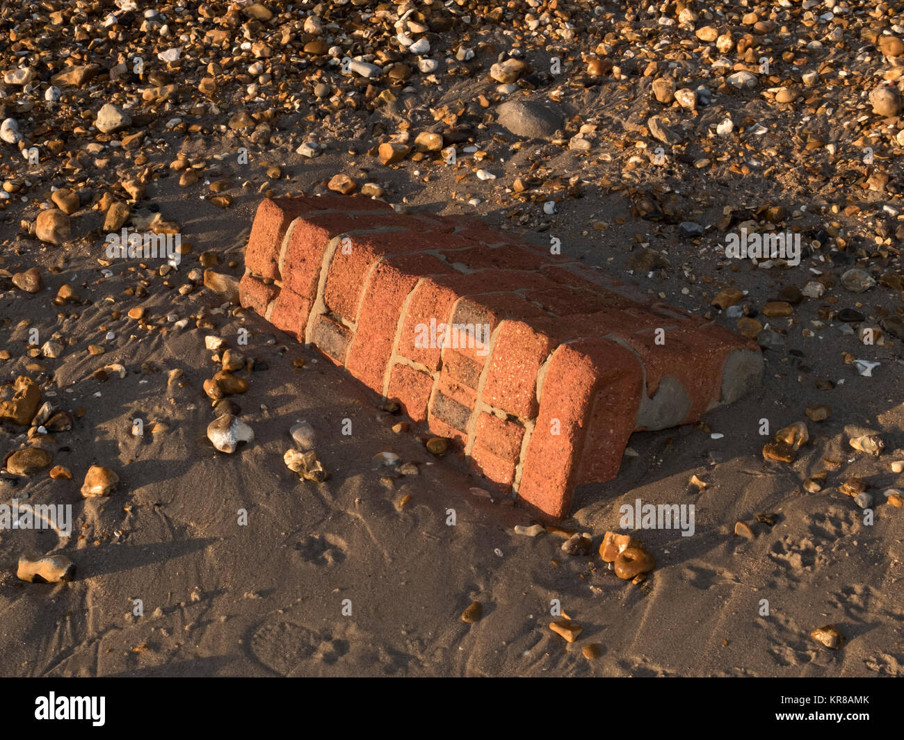 Evidence of cliff and coastal erosion, lost buildings and exposed ...