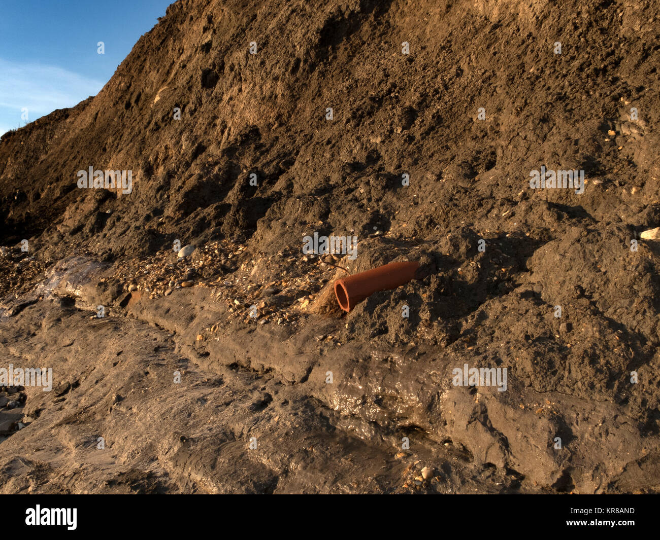 Evidence of cliff and coastal erosion, lost buildings and exposed ...
