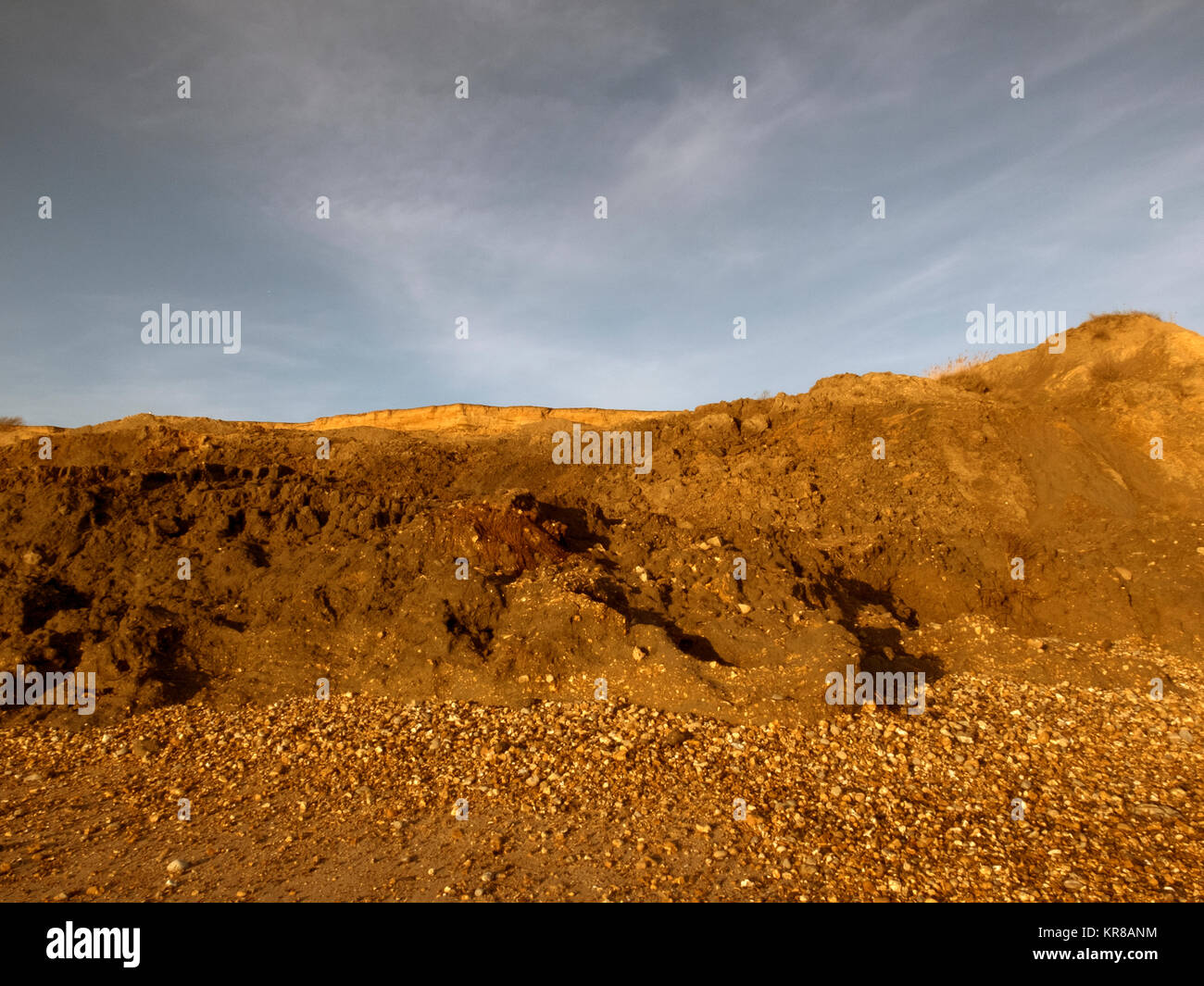 Evidence of cliff and coastal erosion, lost buildings and exposed ...