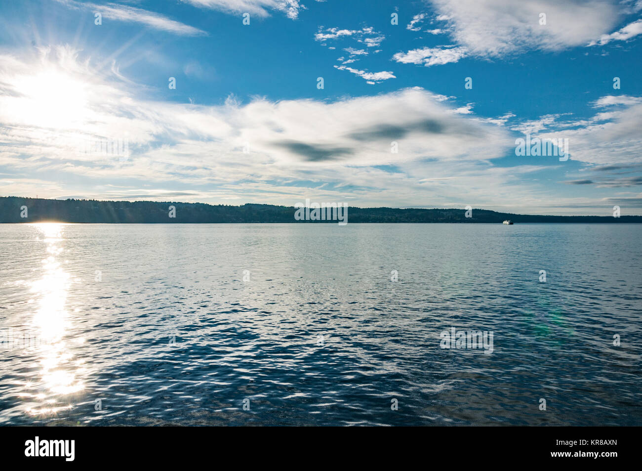 Sun rays reflecting from the water in the bay area, not far from ...