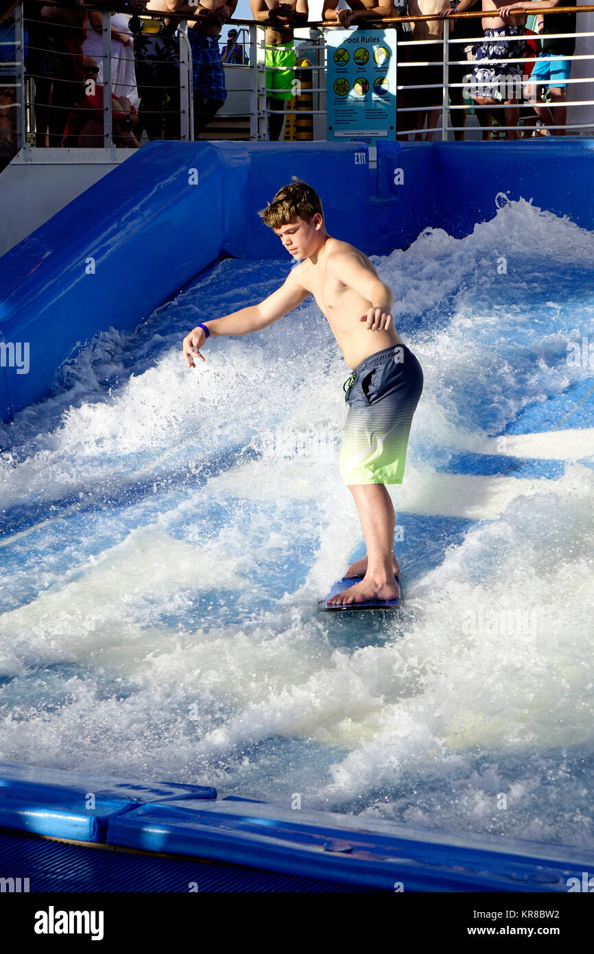 Surfing on the Flowrider Stock Photo - Alamy