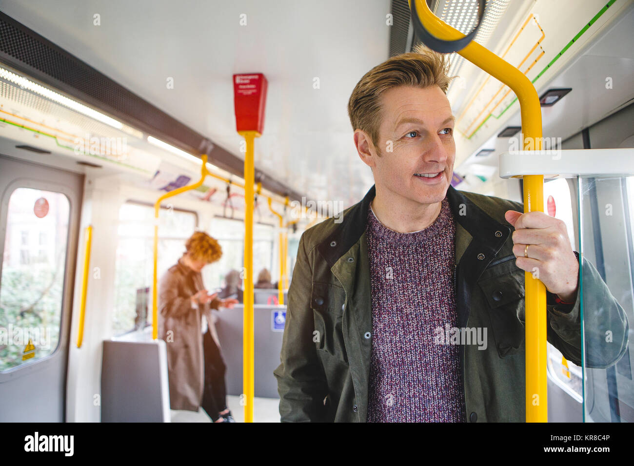 Commuting on the train Stock Photo - Alamy