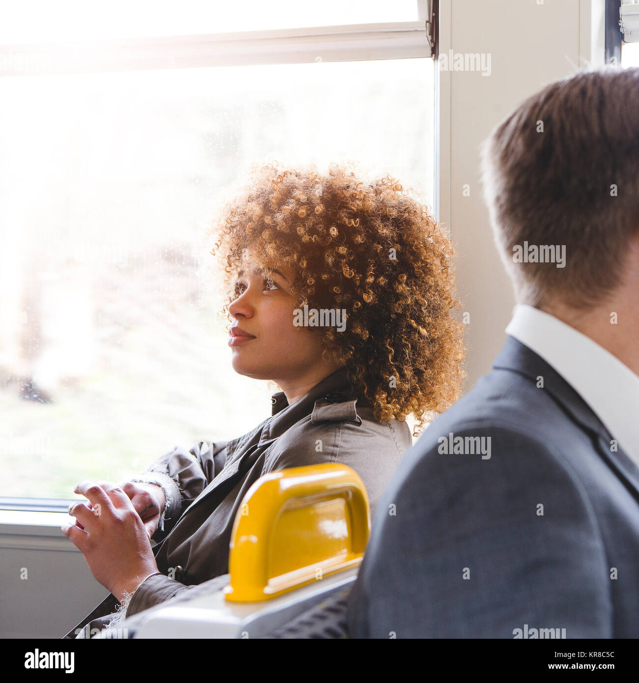 Commuting on the train Stock Photo - Alamy