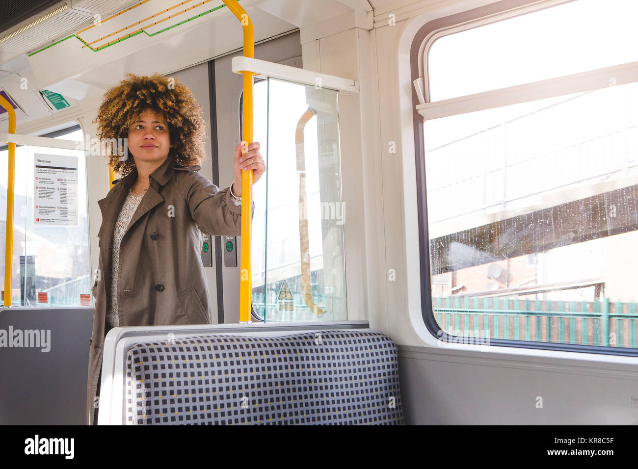 Commuting on the train Stock Photo - Alamy