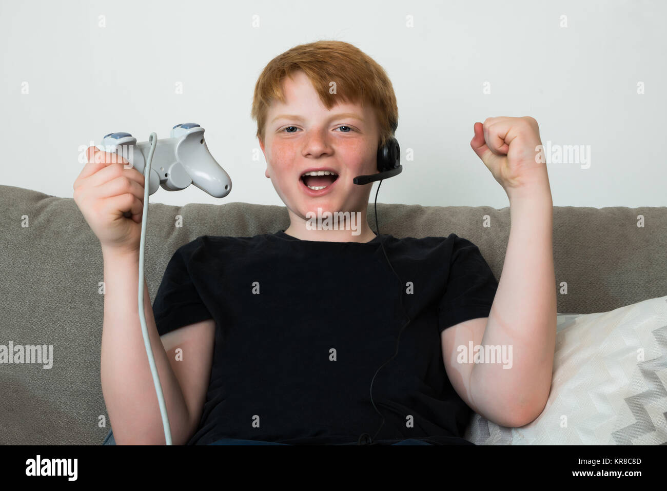 Happy Child Playing Videogames Stock Photo - Alamy