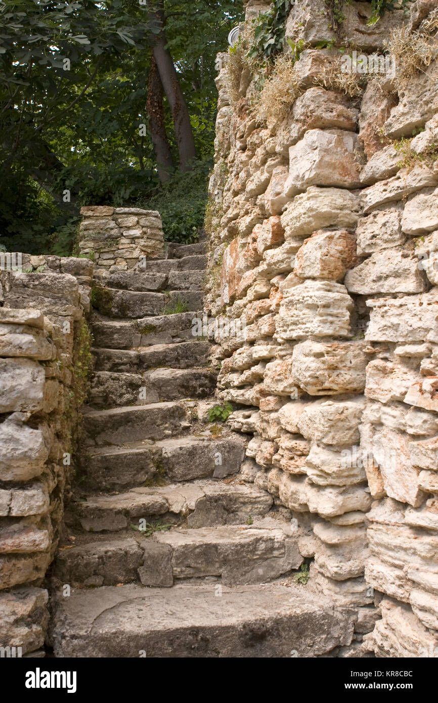 stone stairs in the old castle between two masonry walls Stock Photo ...
