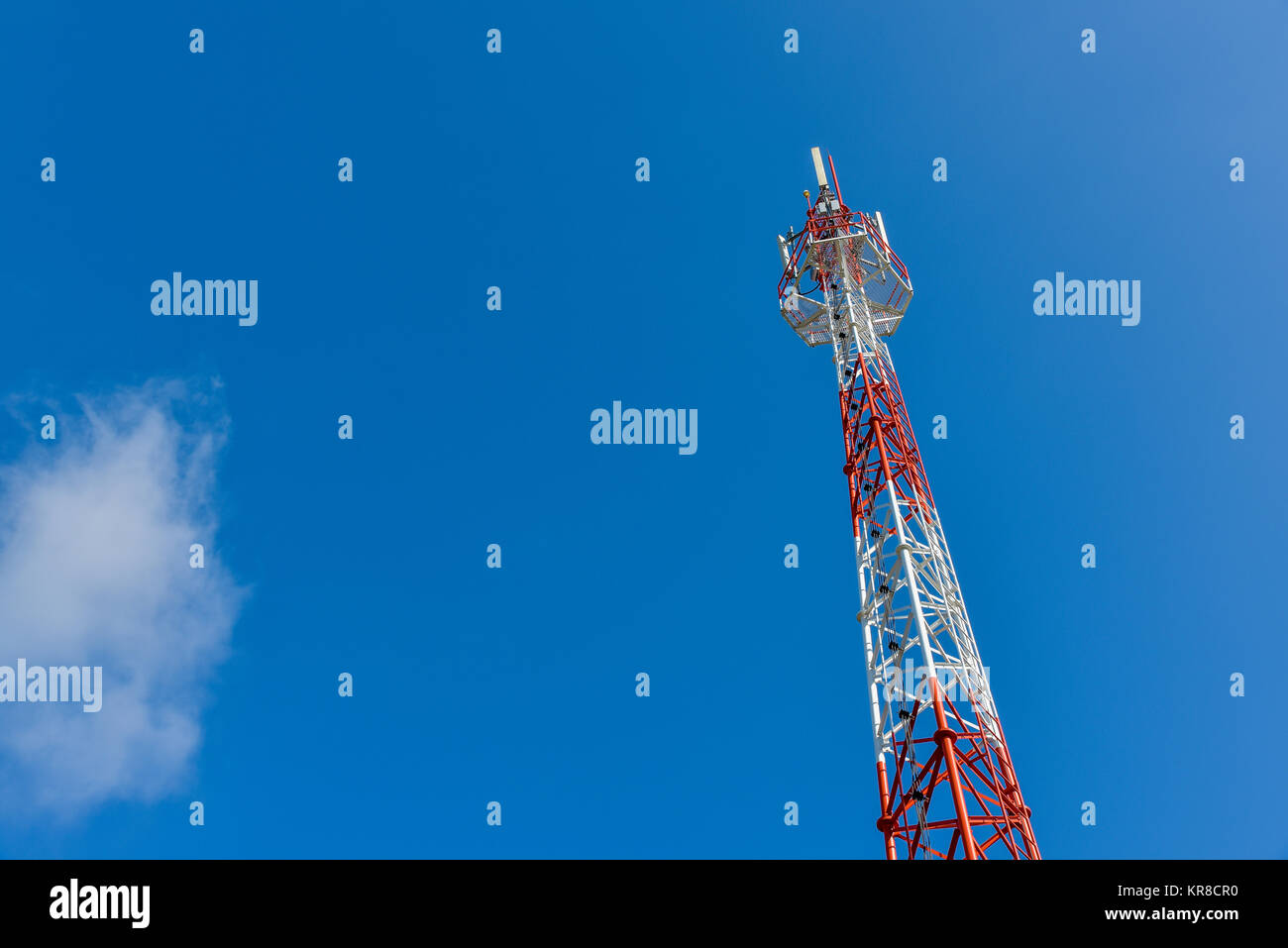 Mobile phone base station tower in blue sky Stock Photo - Alamy