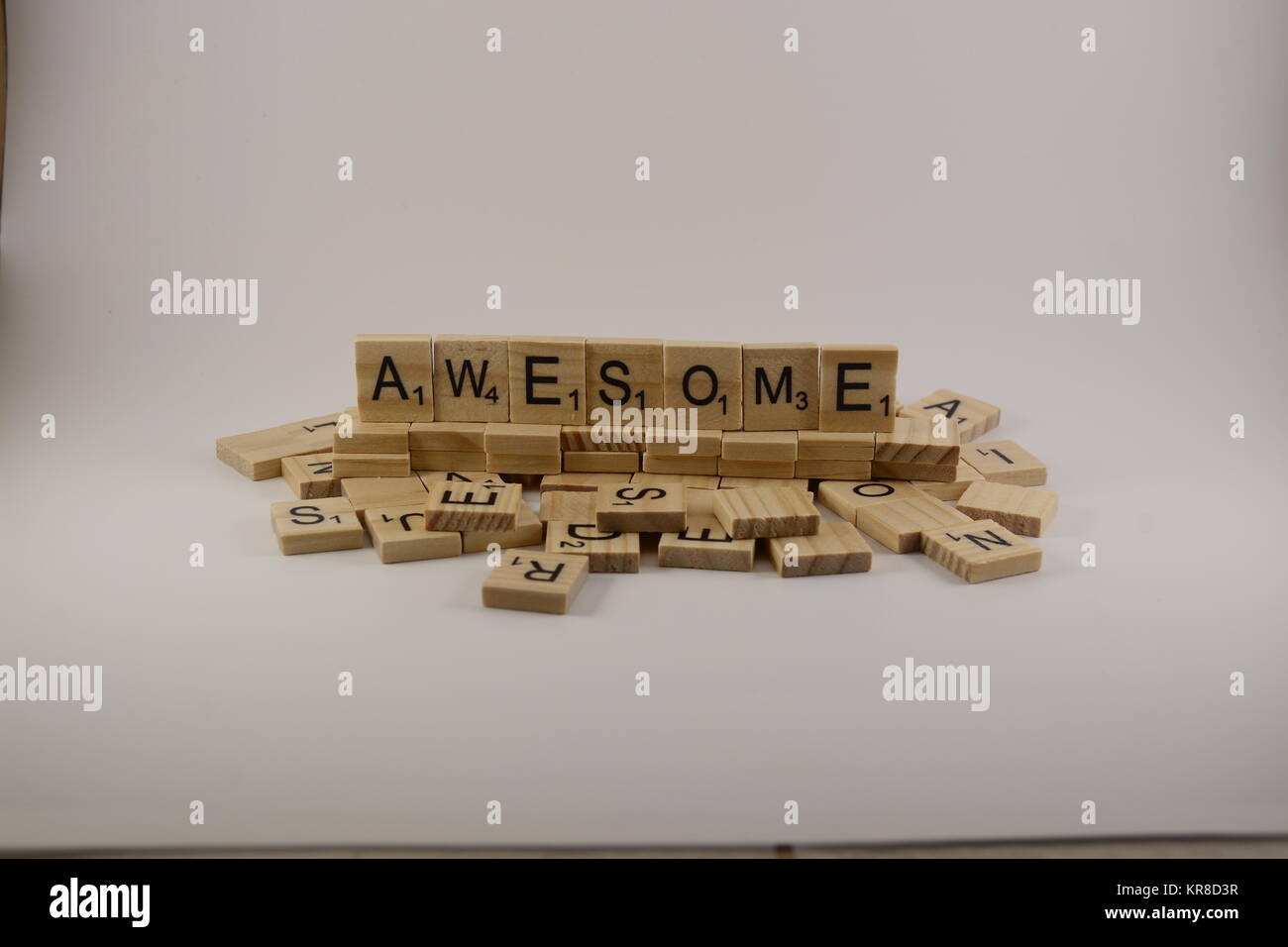 word Awesome written in scrabble tiles Stock Photo - Alamy