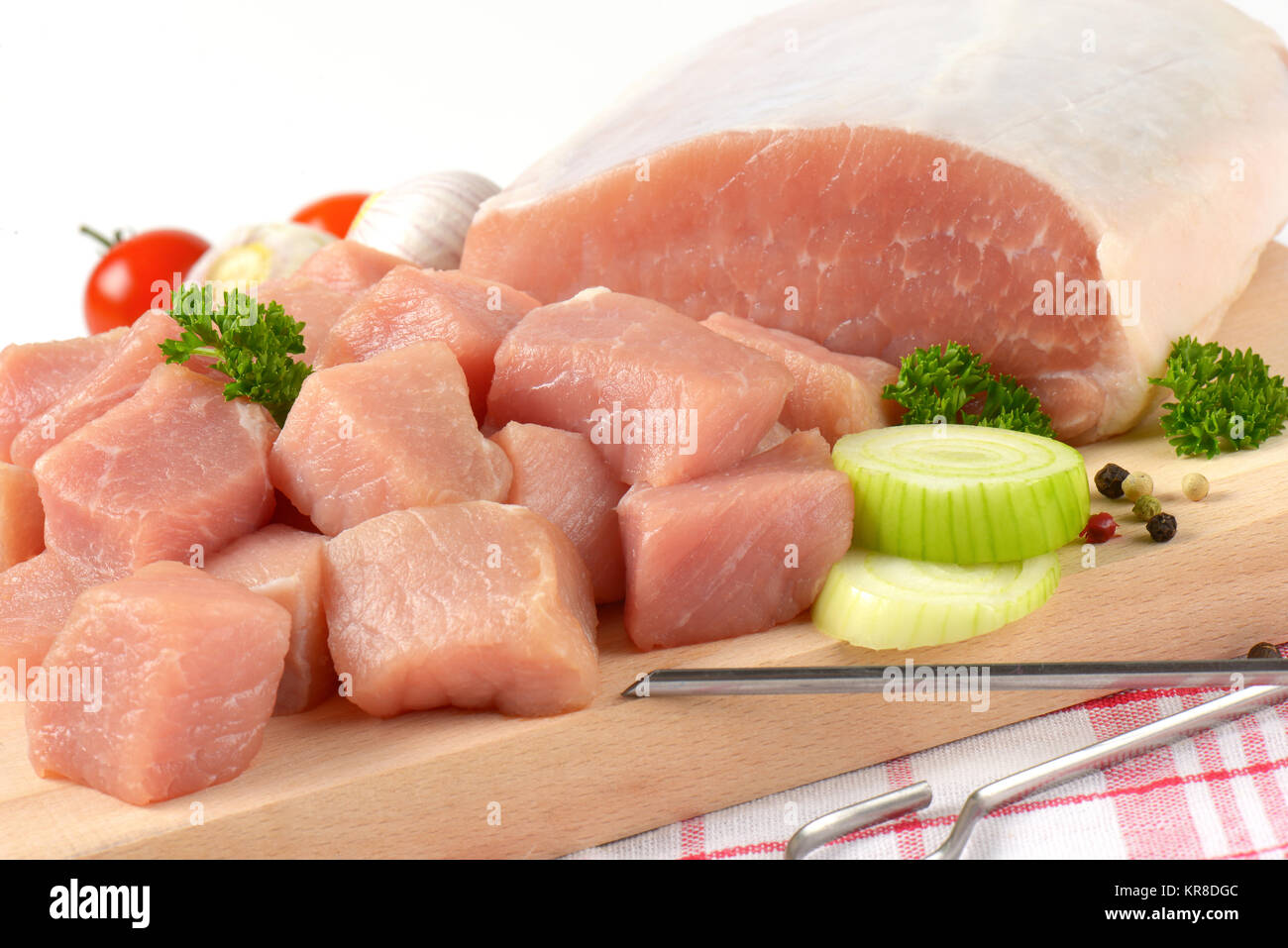 Diced lean raw pork Stock Photo - Alamy