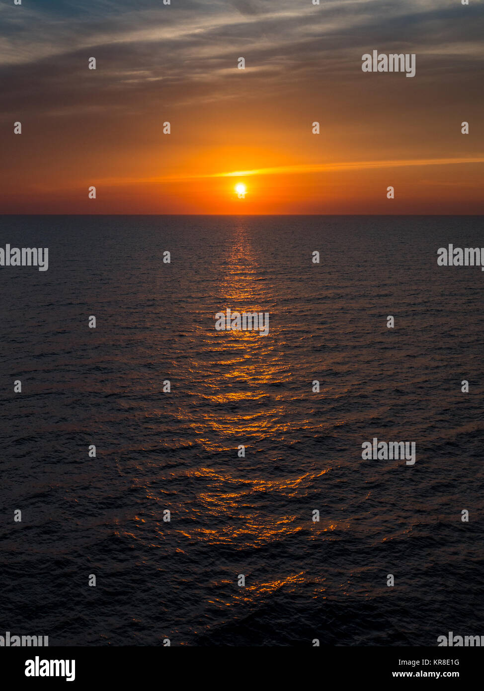 Sunset from a cruiseship Stock Photo - Alamy