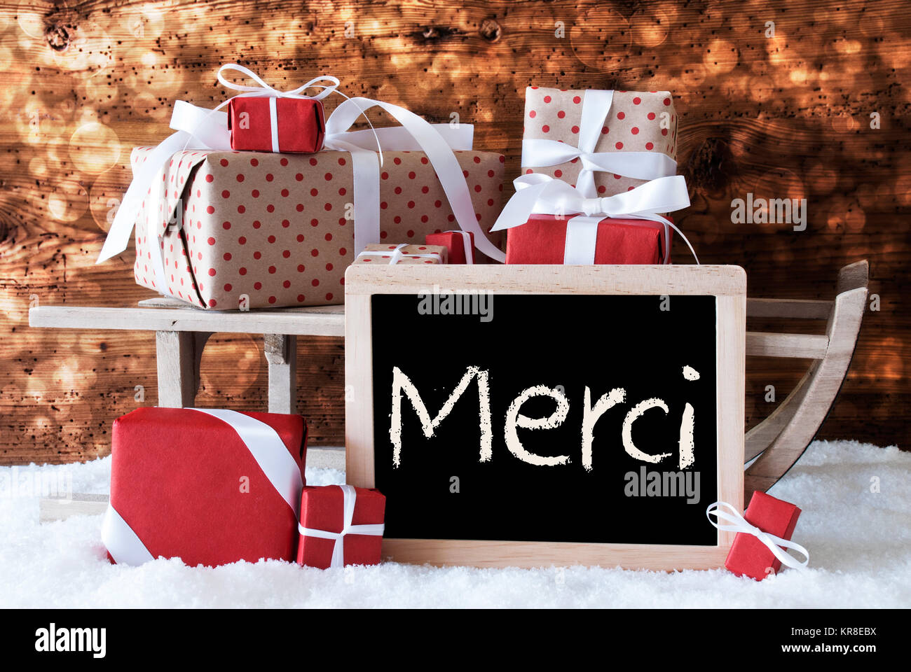 Chalkboard With FrenchText Merci Means Thank You. Sled With Christmas ...