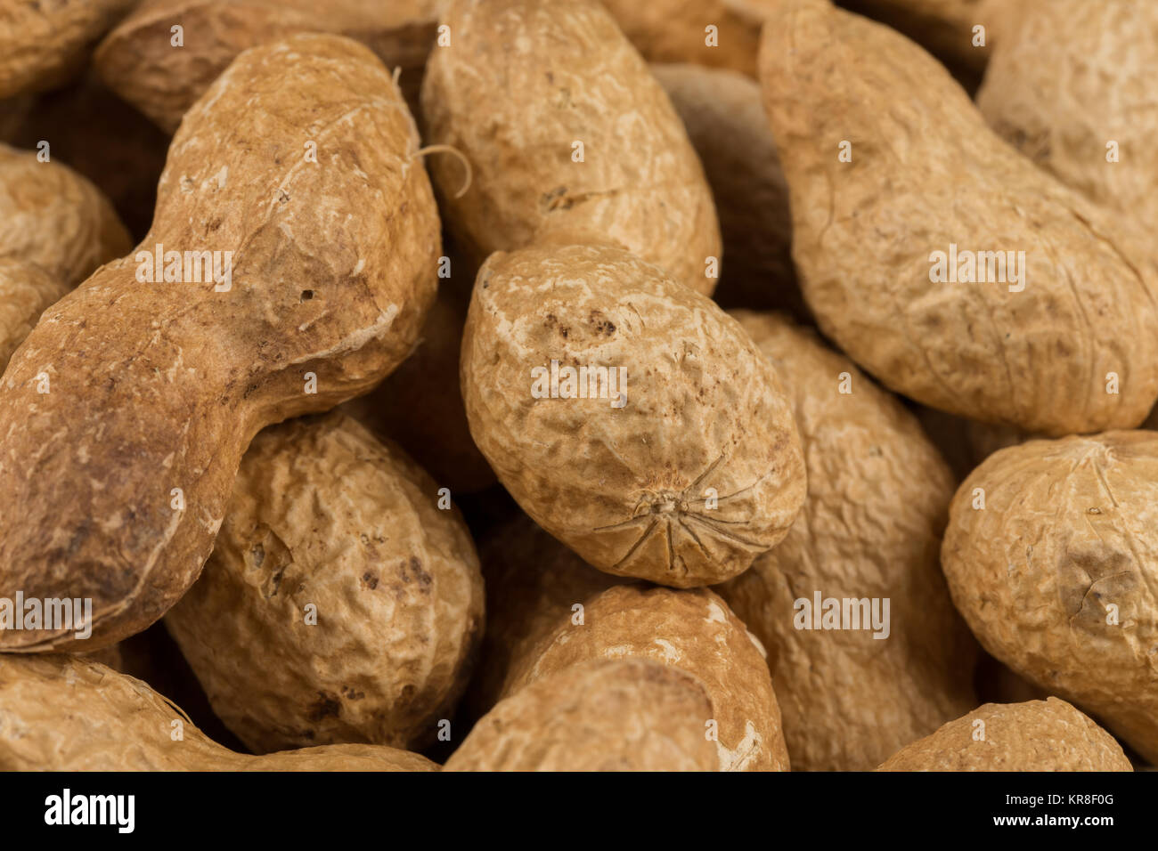 Pile of peanuts shells close up Stock Photo - Alamy