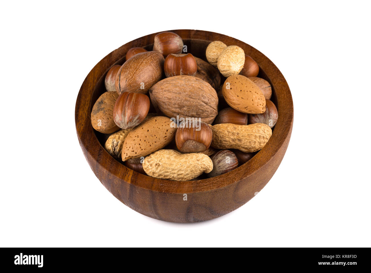 Mixed nuts in shells in a bowl Stock Photo - Alamy