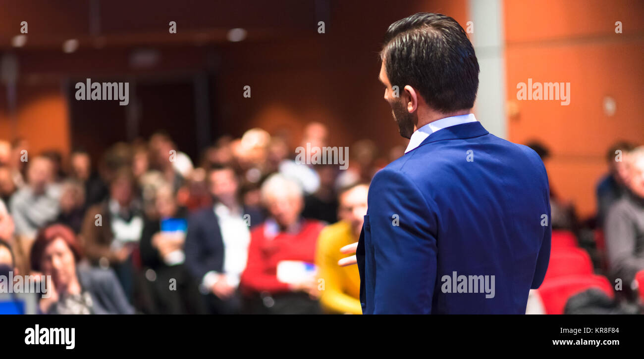 Public speaker giving talk at Business Event Stock Photo - Alamy