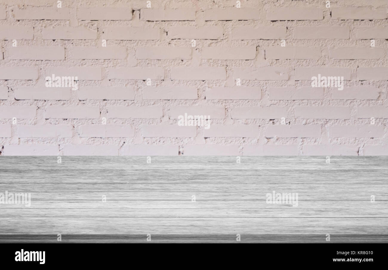 Top of black and white wooden table with white brick wall Stock Photo ...