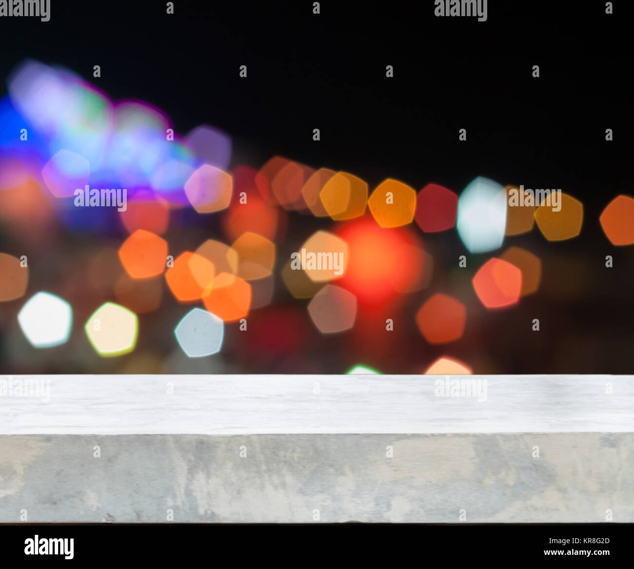 Concrete tabletop with abstract blurred lights Stock Photo - Alamy