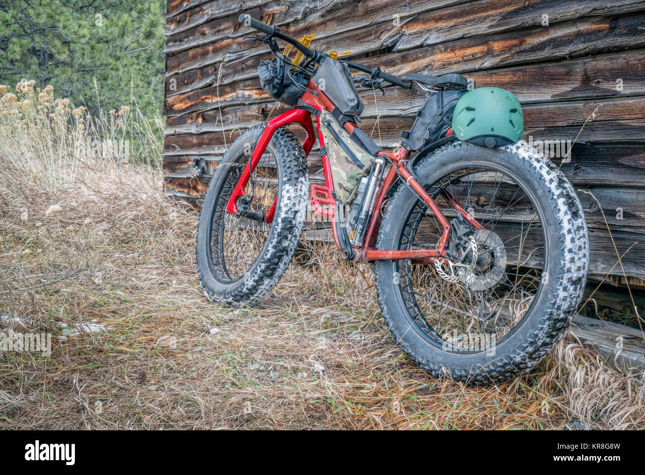 fat bike and rustic mountain cabin in northern Colorado, late fall or ...