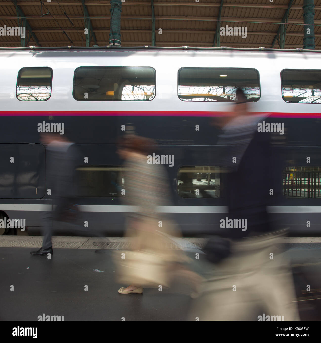 Crowd of people walking on busy station platform hi-res stock ...