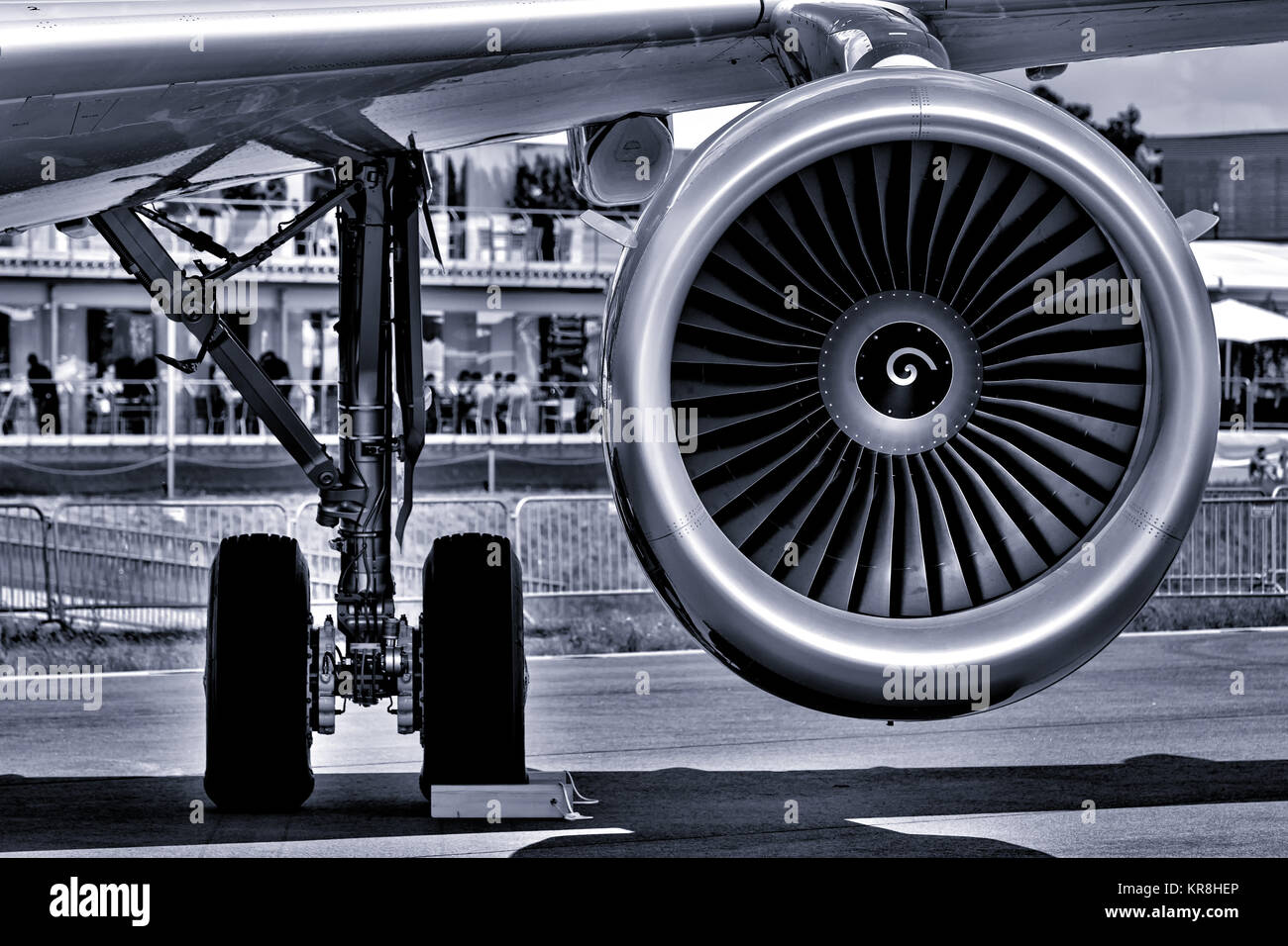 The landing gear and turbofan engine of passenger airliner. Black and ...