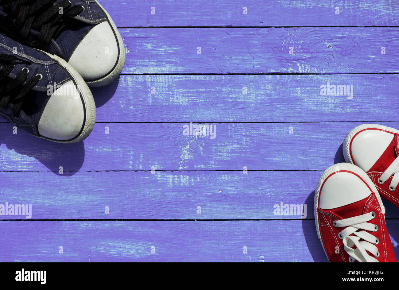 Two pairs of sports sneakers Stock Photo - Alamy