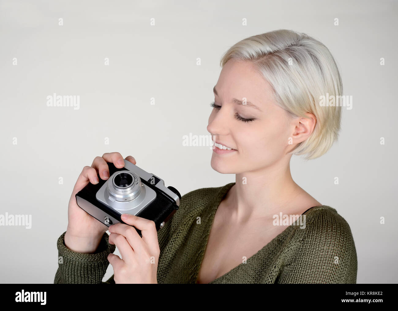 young woman with old camera Stock Photo - Alamy