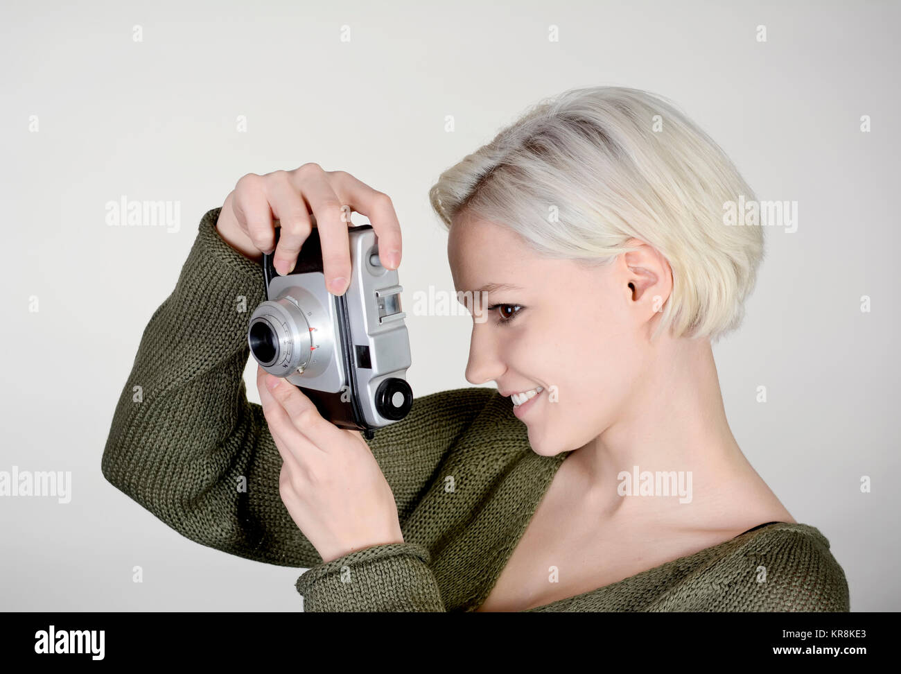 young woman with old camera Stock Photo - Alamy