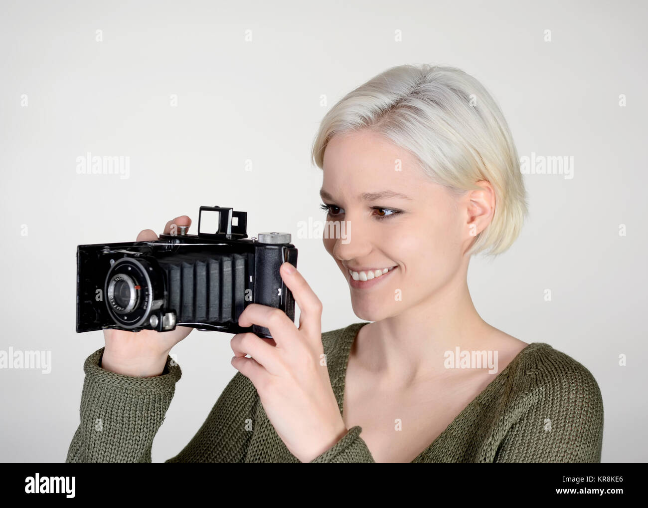 young woman with old camera Stock Photo - Alamy