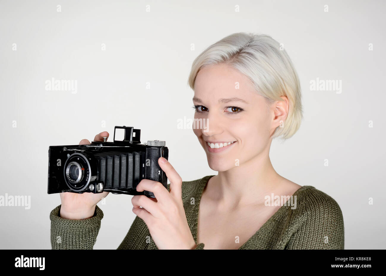 young woman with old camera Stock Photo - Alamy