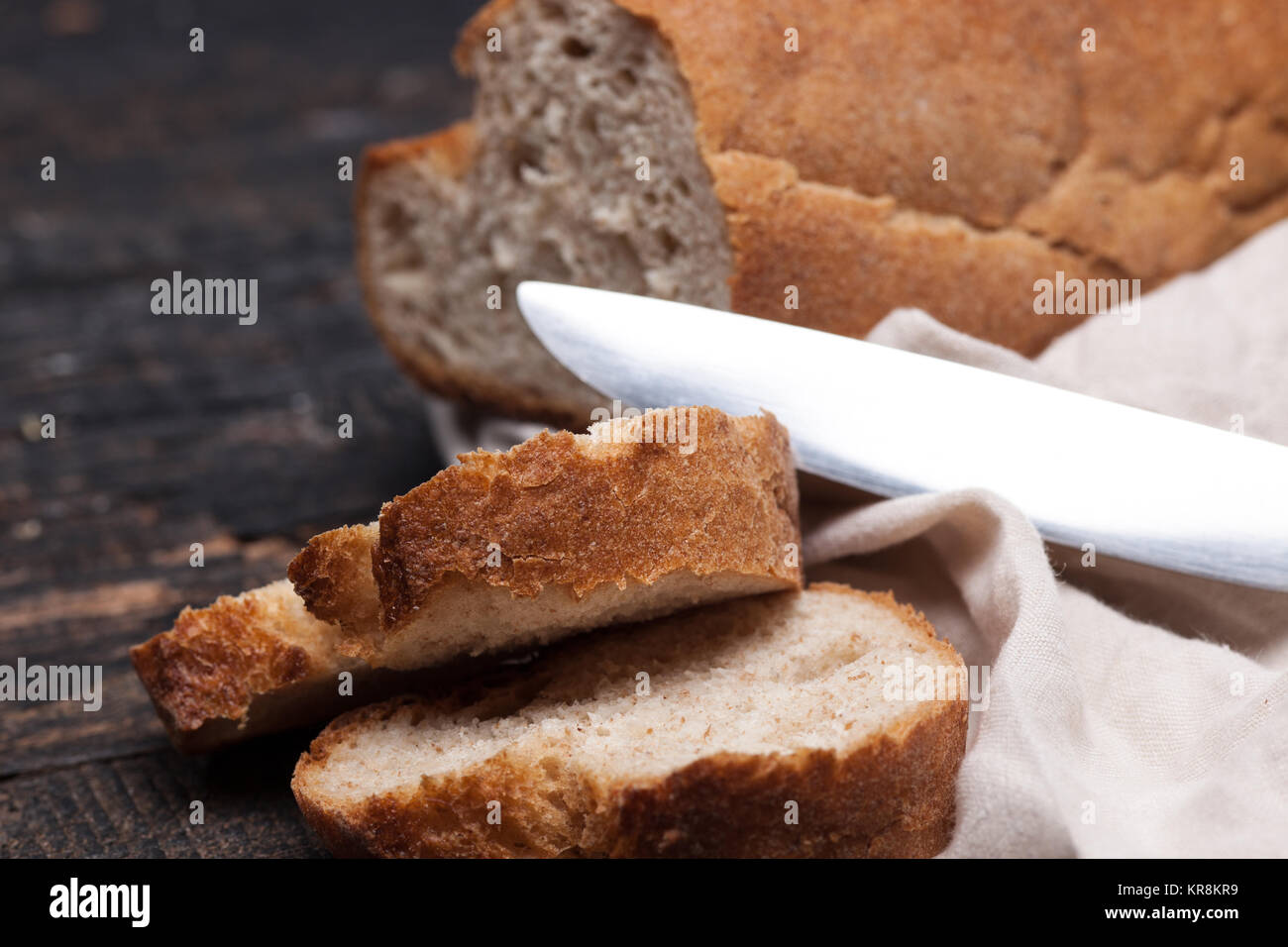 Rustic bread on wood table. Dark woody background with free text space ...